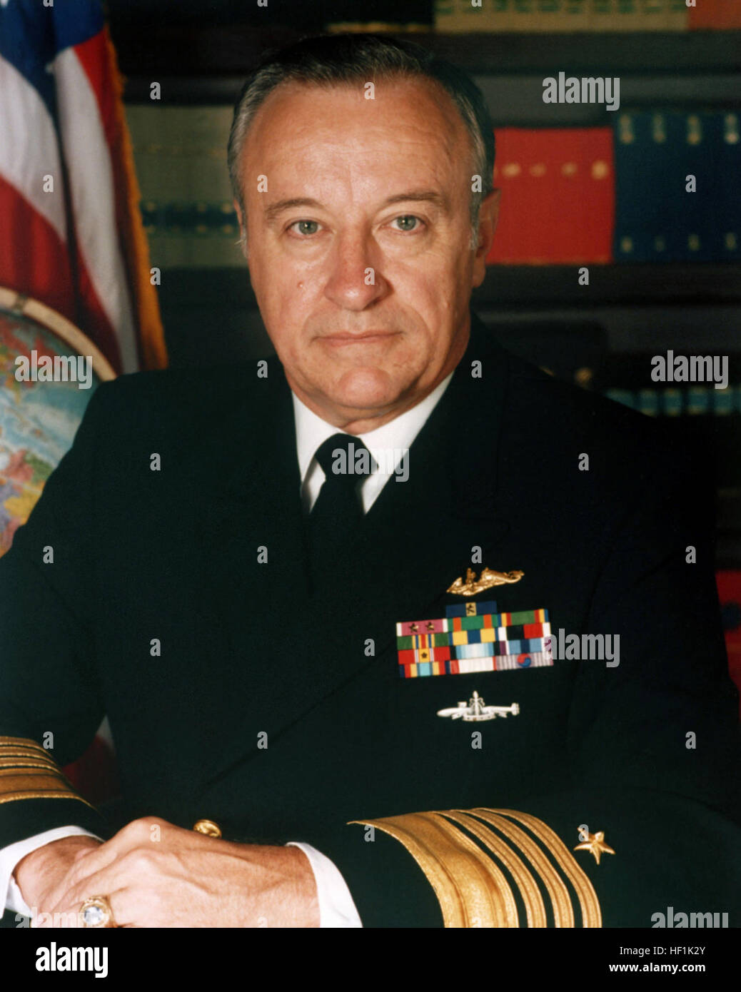 Admiral of the U.S. Navy conducts official duties, providing leadership ...