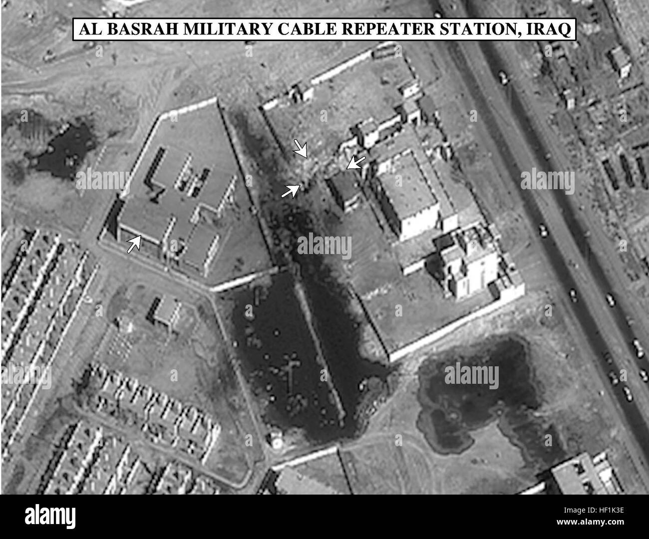 A bomb damage assessment photo of the Al Basrah Military Cable Repeater ...
