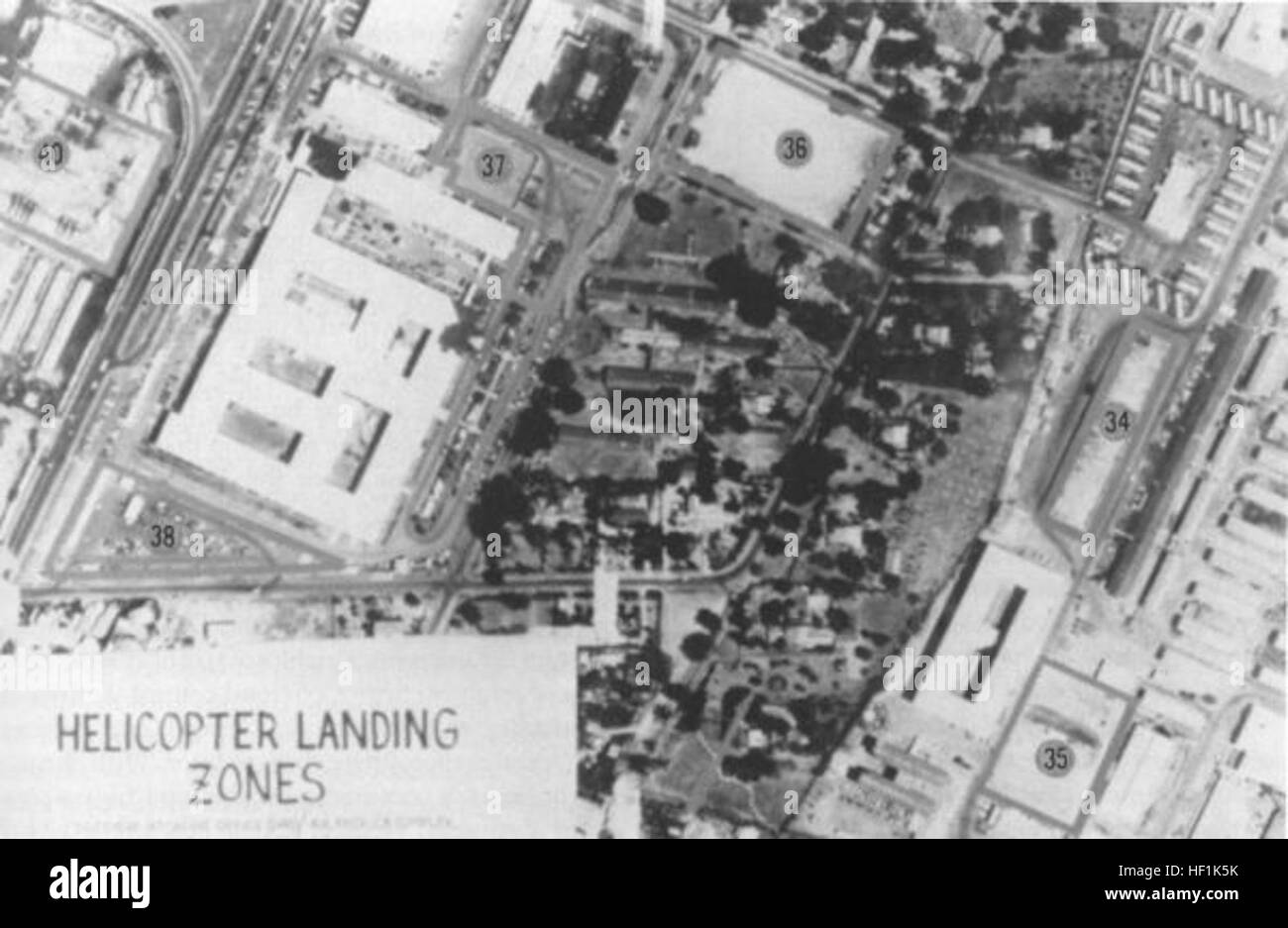 Designated landing zones at a DAO compound are prepared for helicopter ...