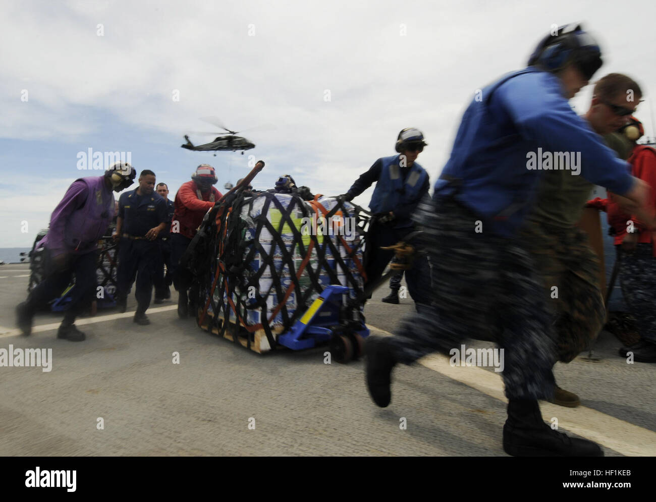 Sailors and Marines aboard U.S. 7th Fleet command flagship USS Blue ...