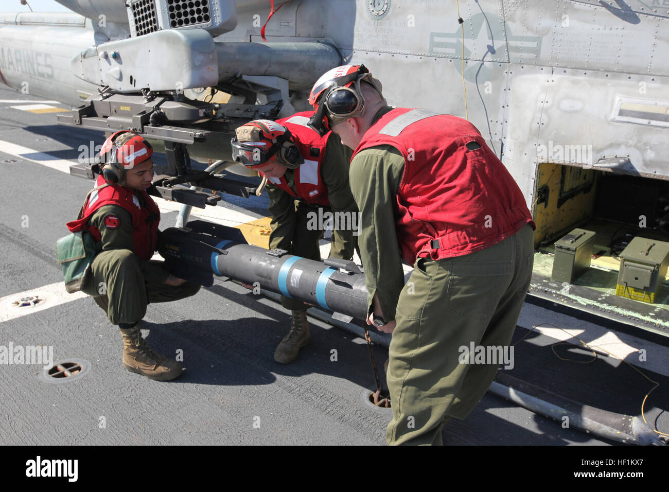 Ordnance Marines with Marine Light Attack Helicopter Squadron 167 ...