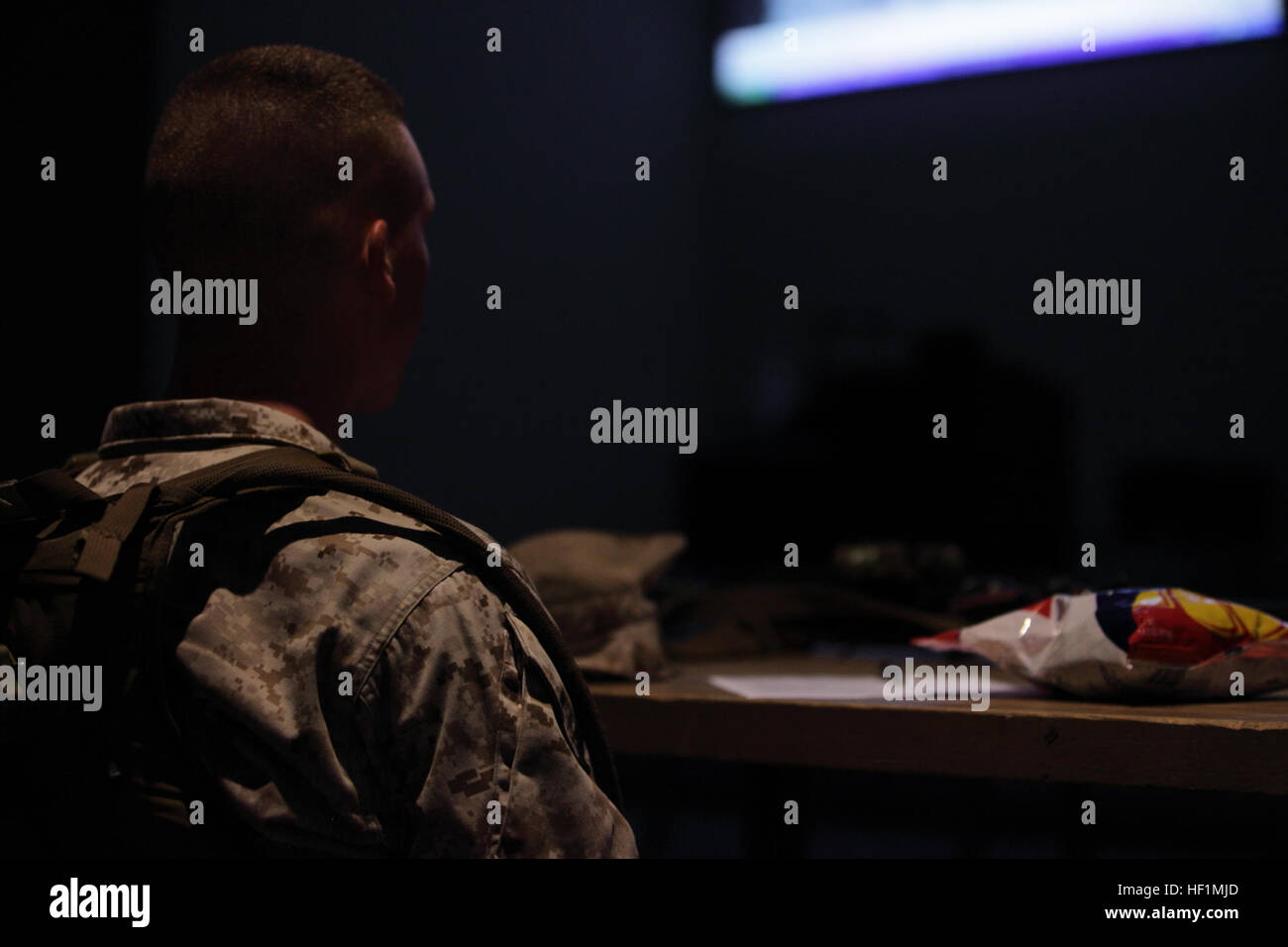 A U.S. Marine with Delta Company, ITB, observes training materials ...