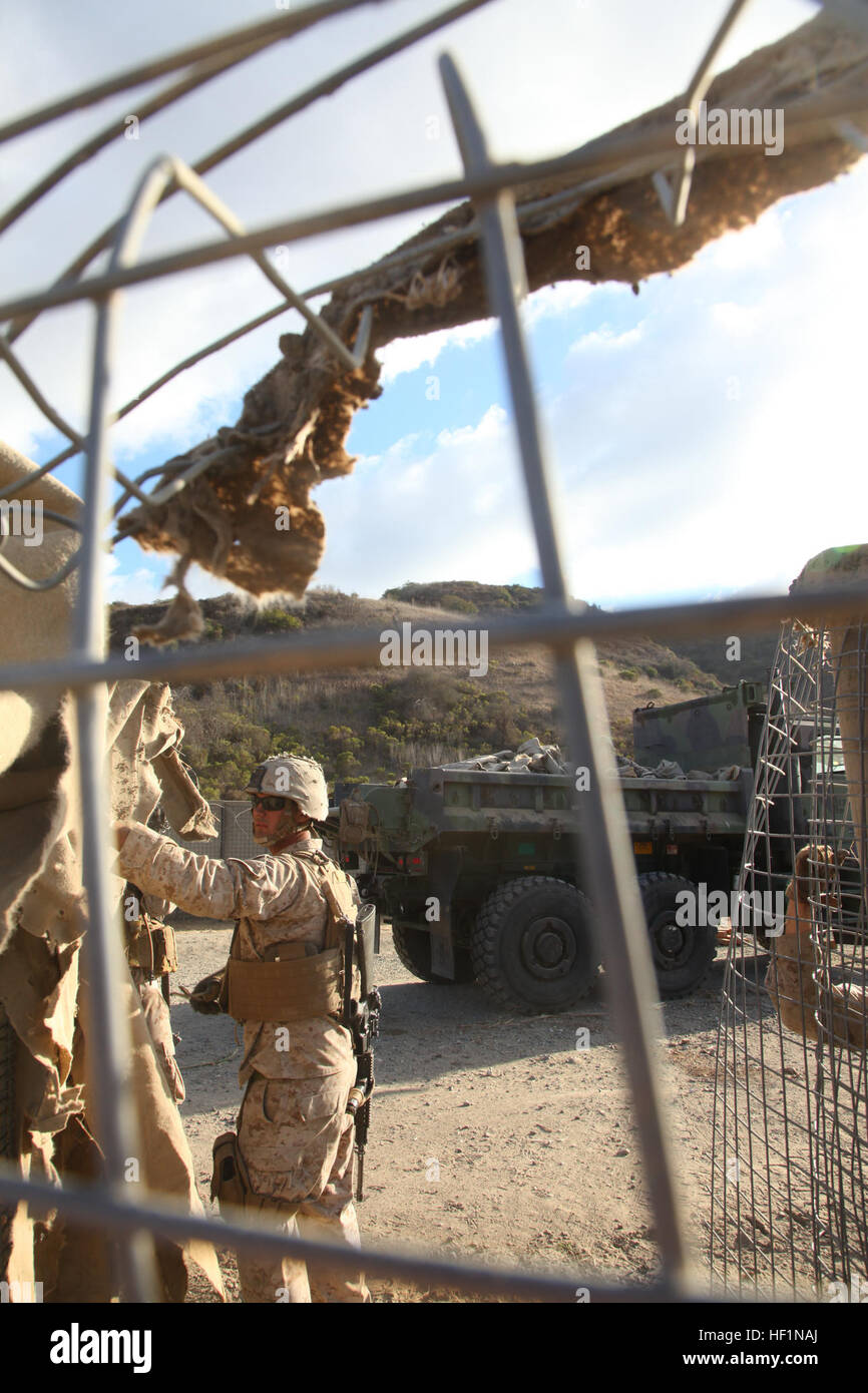 Corporal Scott Layne, a team leader with Alpha Company, 7th Engineer ...