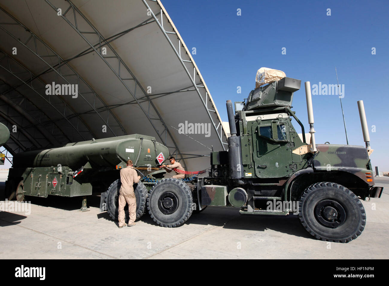 U.S. Marines Sgt. David W. Leach, left, a shop chief, and Sgt. Dennis B ...