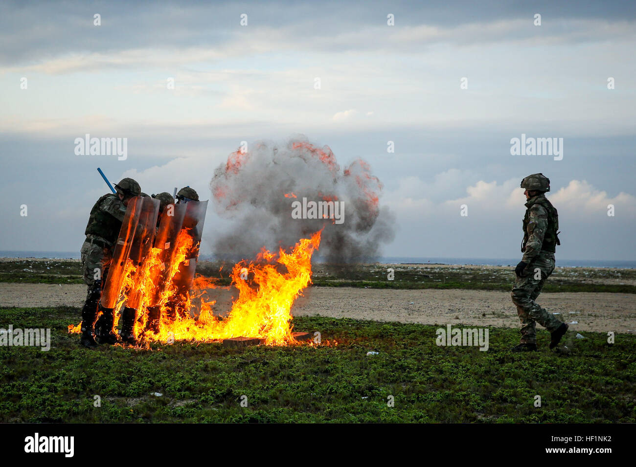 British marines demonstrate proper riot control techniques during ...
