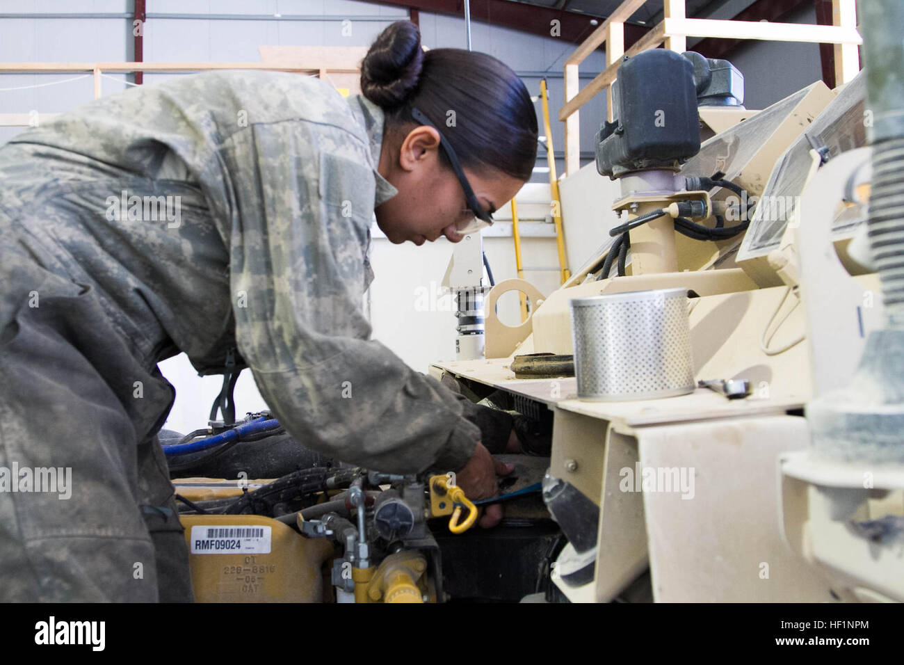 Spc. Stephanie Reyes, a wheeled vehicle mechanic with Company B ...
