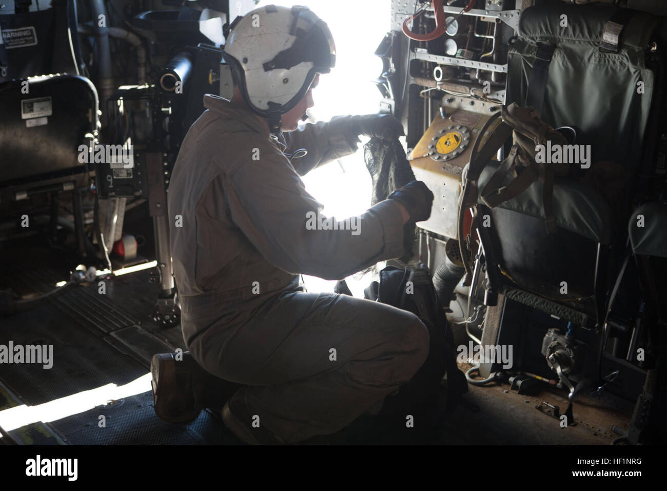 U.S. Marine Corps Corporal Brandon S. Lamora, Crew Chief performs a ...