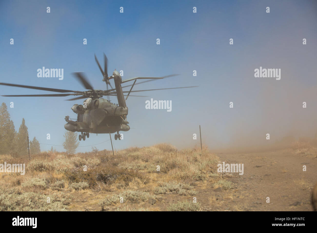 A U.S. Marine Corps CH-53E Super Stallion transport helicopter with ...