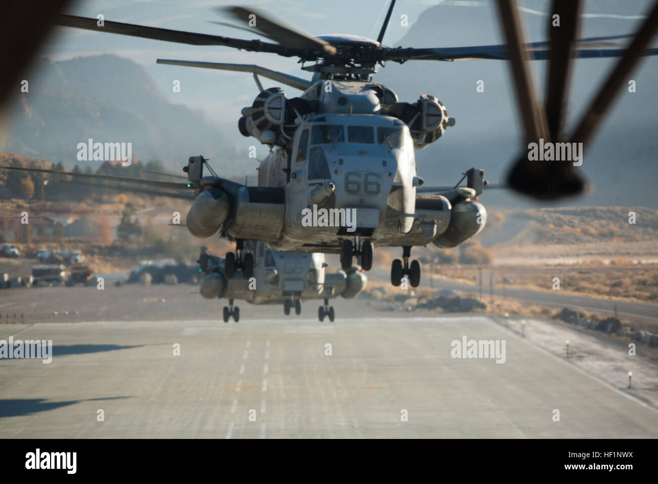 Four U.S. Marine Corps CH-53E Super Stallion transport helicopters with ...