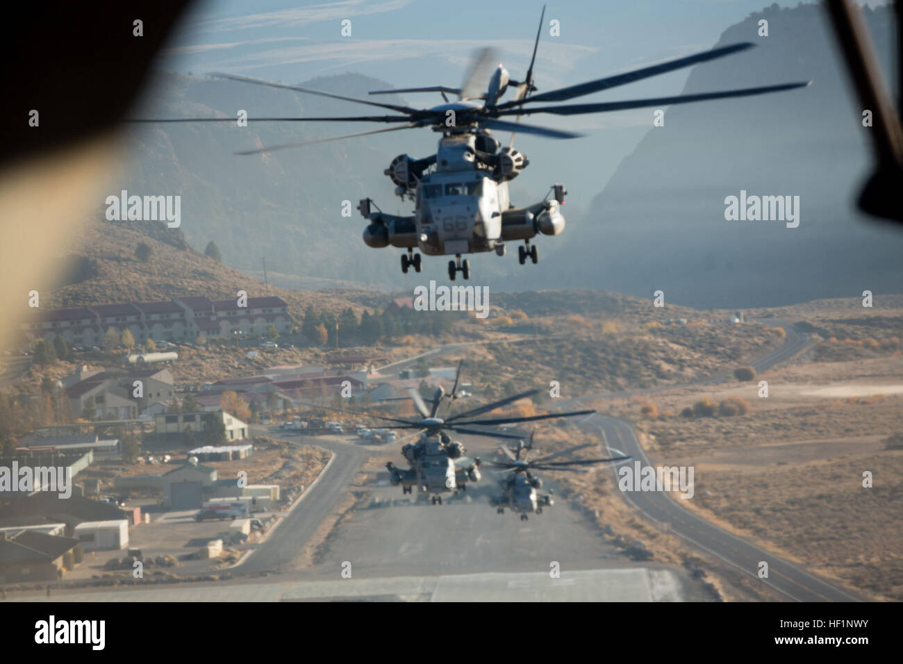 Four U.S. Marine Corps CH-53E Super Stallion transport helicopters with ...