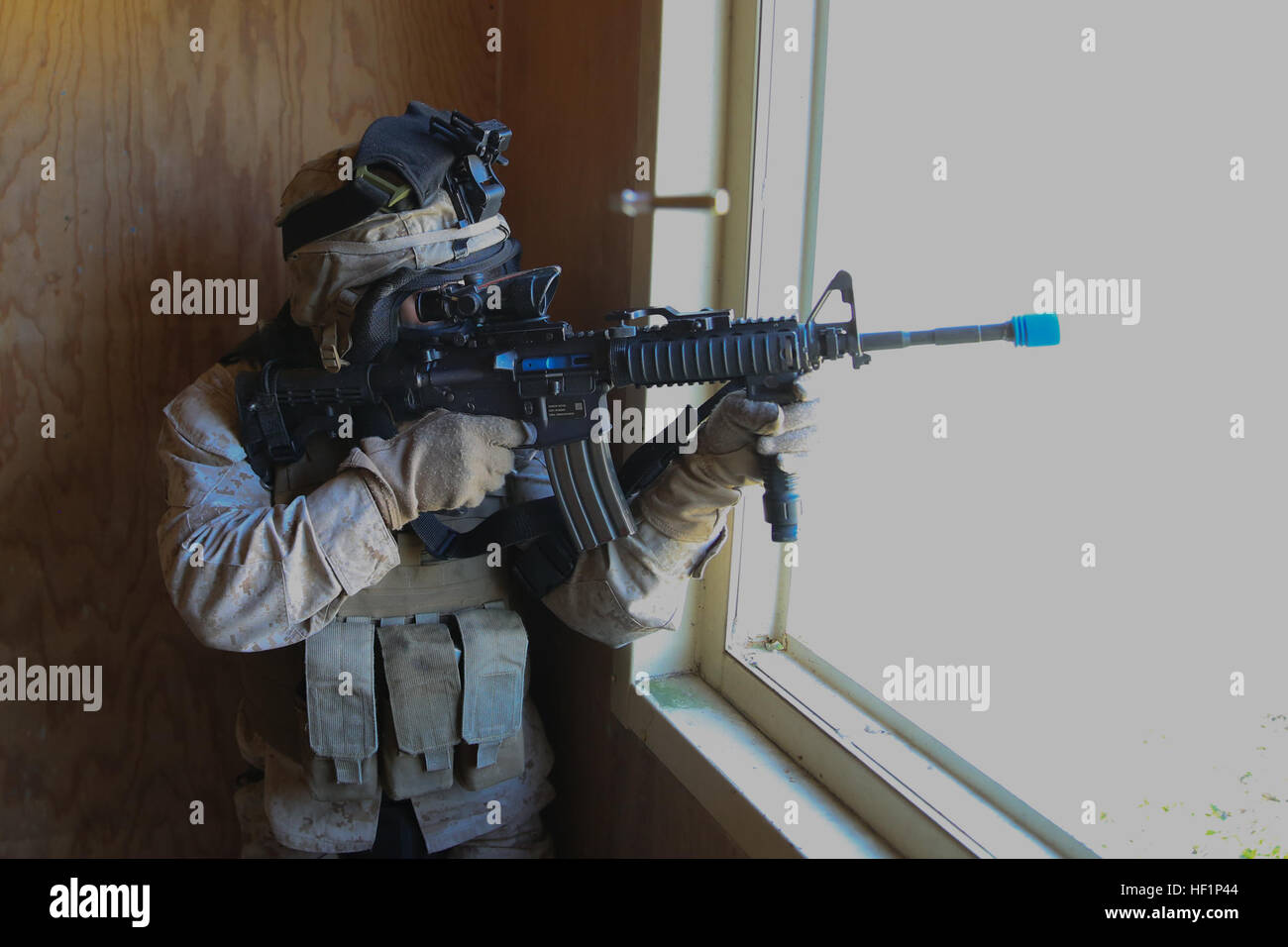 A SESAMS (simulated ammunition) shell flies out the M4 assault rifle ...