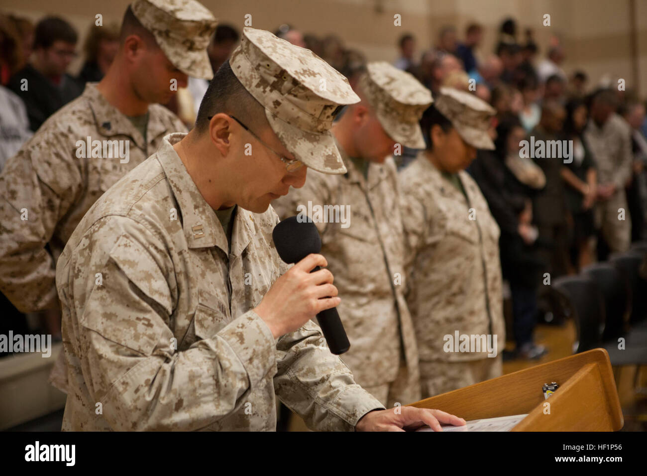 A chaplain delivers the invocation at the graduation ceremony of India ...