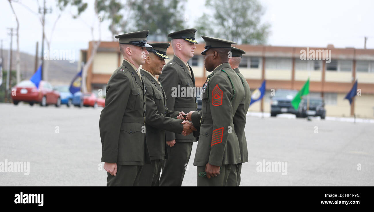Colonel Jason Bohm, commanding officer, 5th Marine Regiment, passes the ...