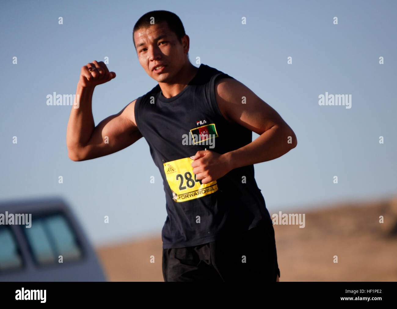 Runners compete in the 2013 Marine Corps Marathon Forward at Camp ...