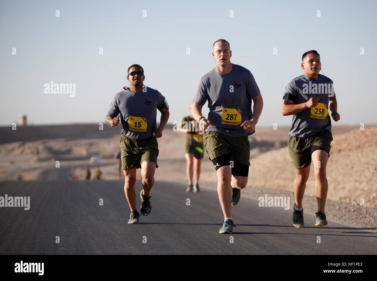 Runners compete in the 2013 Marine Corps Marathon Forward at Camp ...