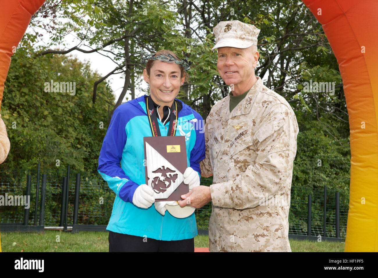 The Commandant of the Marine Corps, Gen. James F. Amos, right, poses ...