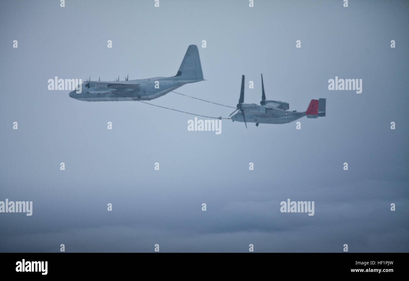 An MV-22B Osprey tiltrotor aircraft receives fuel Oct. 30 from a KC ...