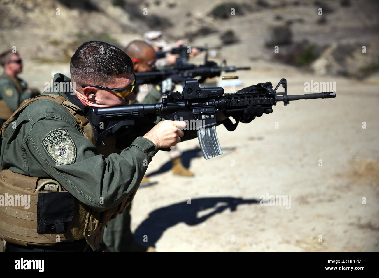 Marines in the Camp Pendleton Special Reaction Team engage targets held ...