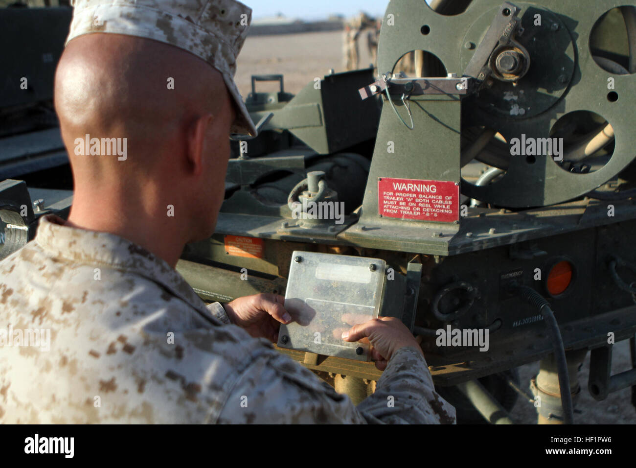 Marine Chief Warrant Officer Martin Hood, turns off the TPS-59 radar ...