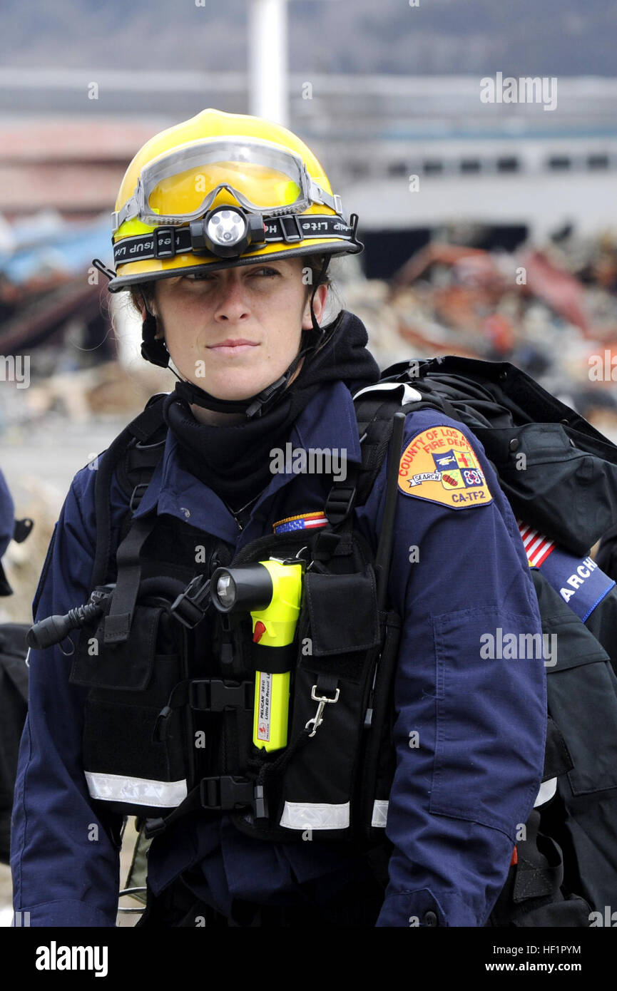 Firefighters and search and rescue personnel from CA-TF2, Los Angeles ...