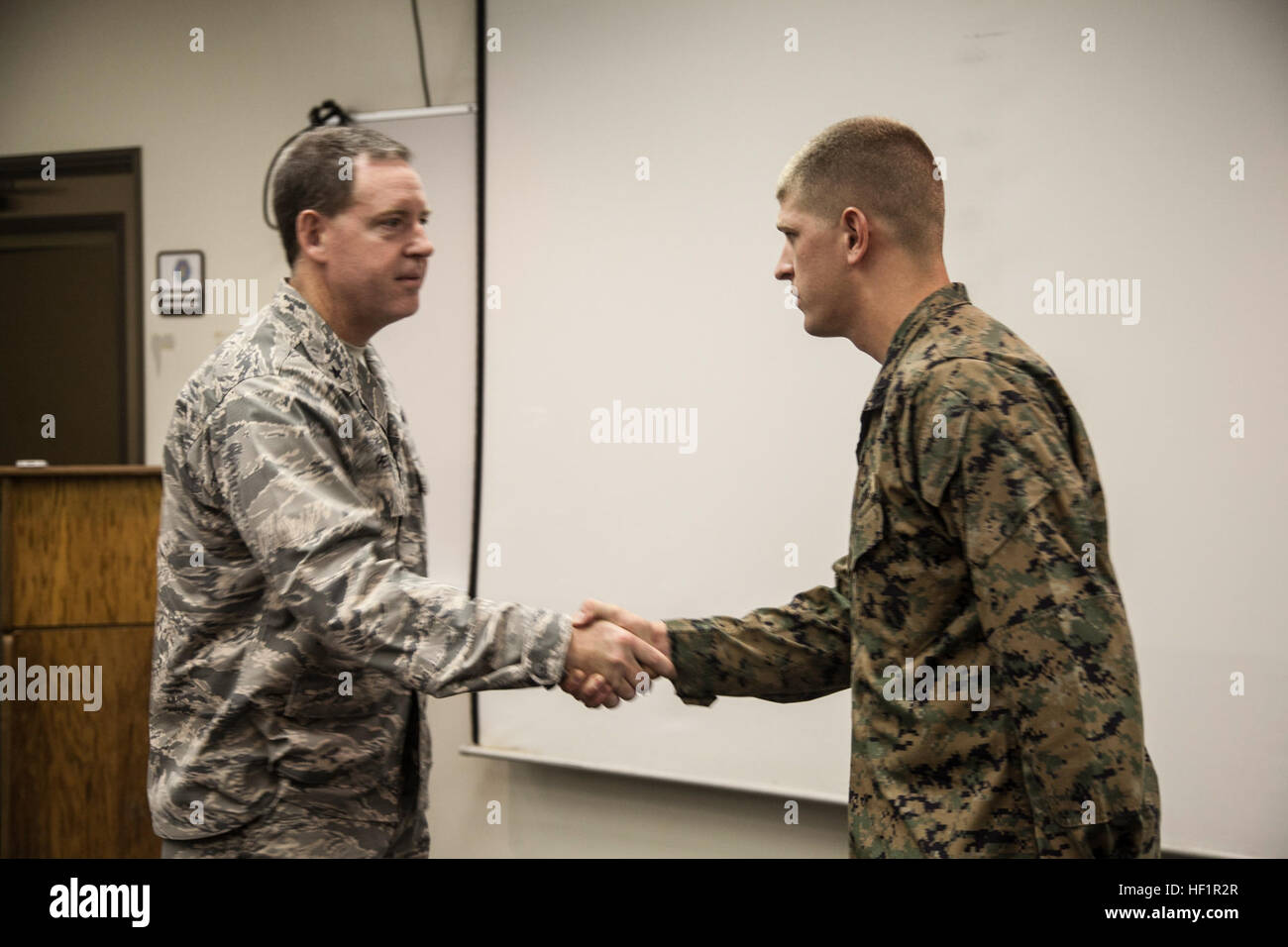 Brig. Gen. James B. Hecker speaks to Lance Cpl. Stosh K. Fernandez, Nov ...