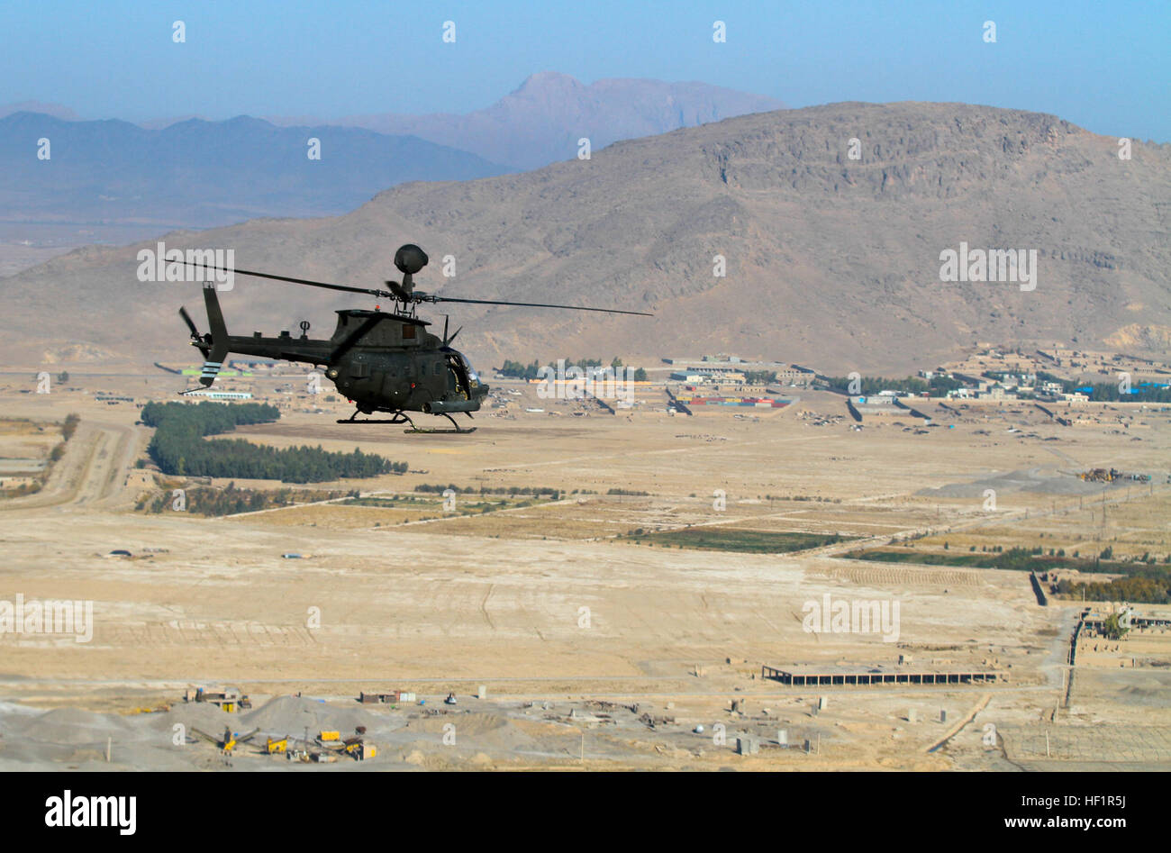 An OH-58 Kiowa helicopter flies during a reconnaissance mission in ...