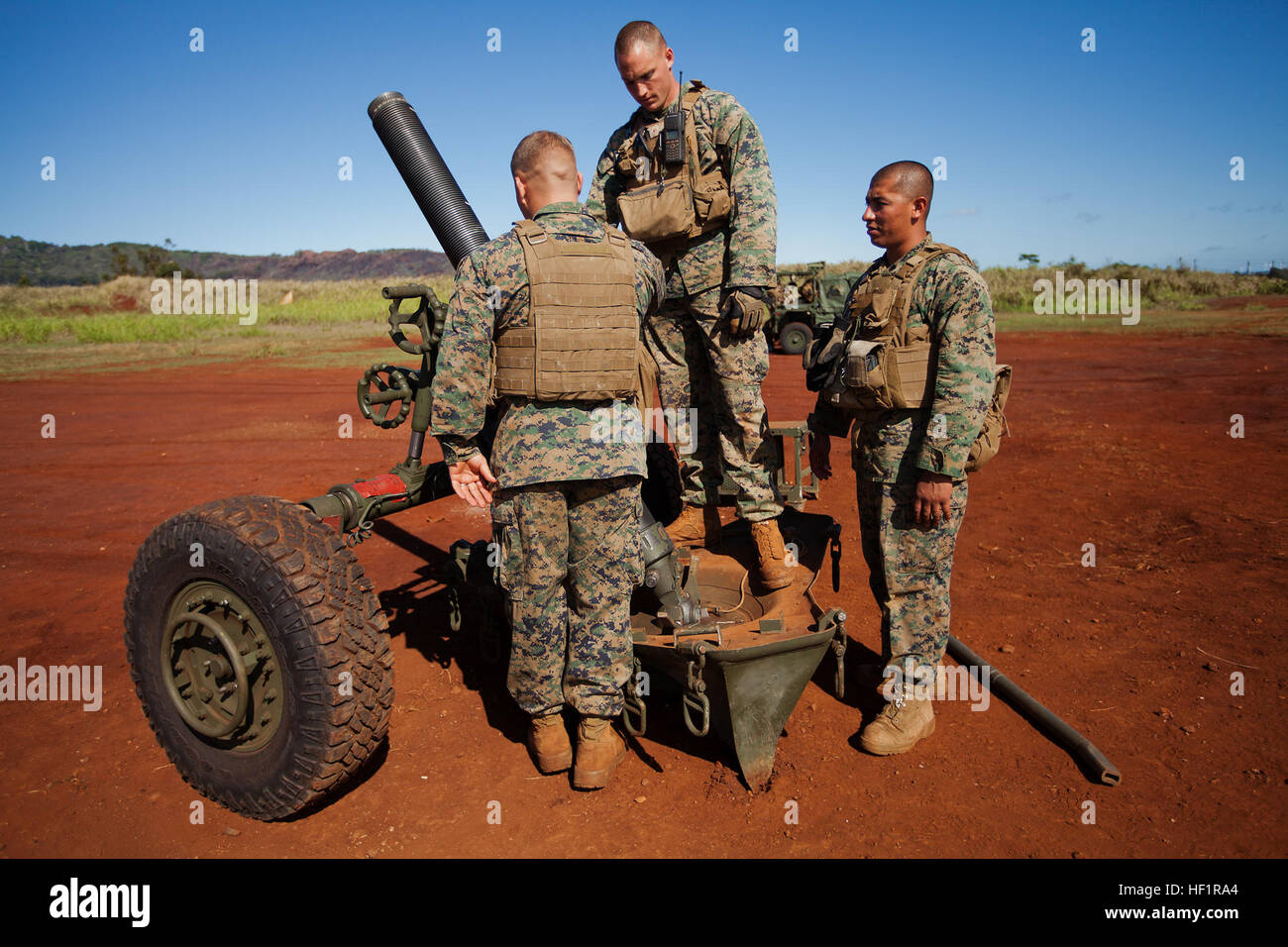 Sgt. Ricardo Monge (right), a gunner with Bravo Battery, 1st Battalion ...