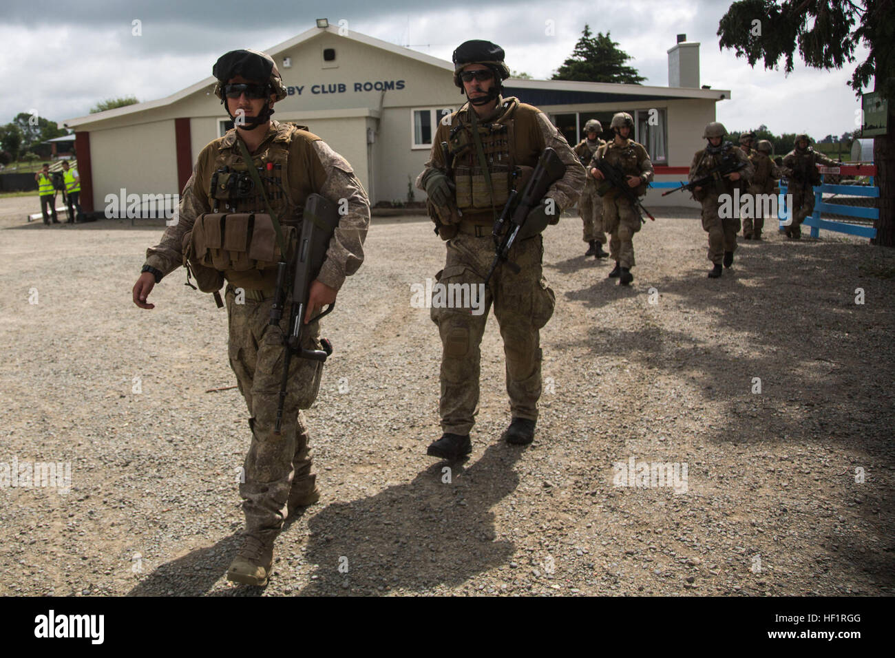 New Zealand Army soldiers prepare to off-load a U-1700 Unimog after a ...