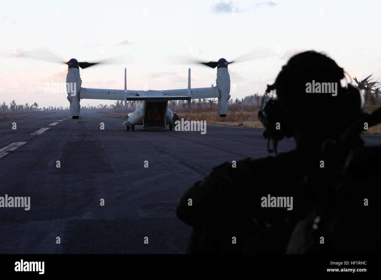 A Marine crew member with Marine Aerial Refueler Transport Squadron 152 ...