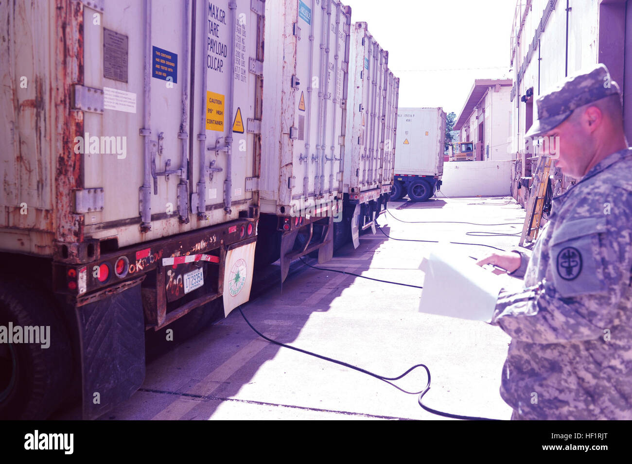 Army Sgt. Todd Whitehead, a veterinary food inspector assigned to ...