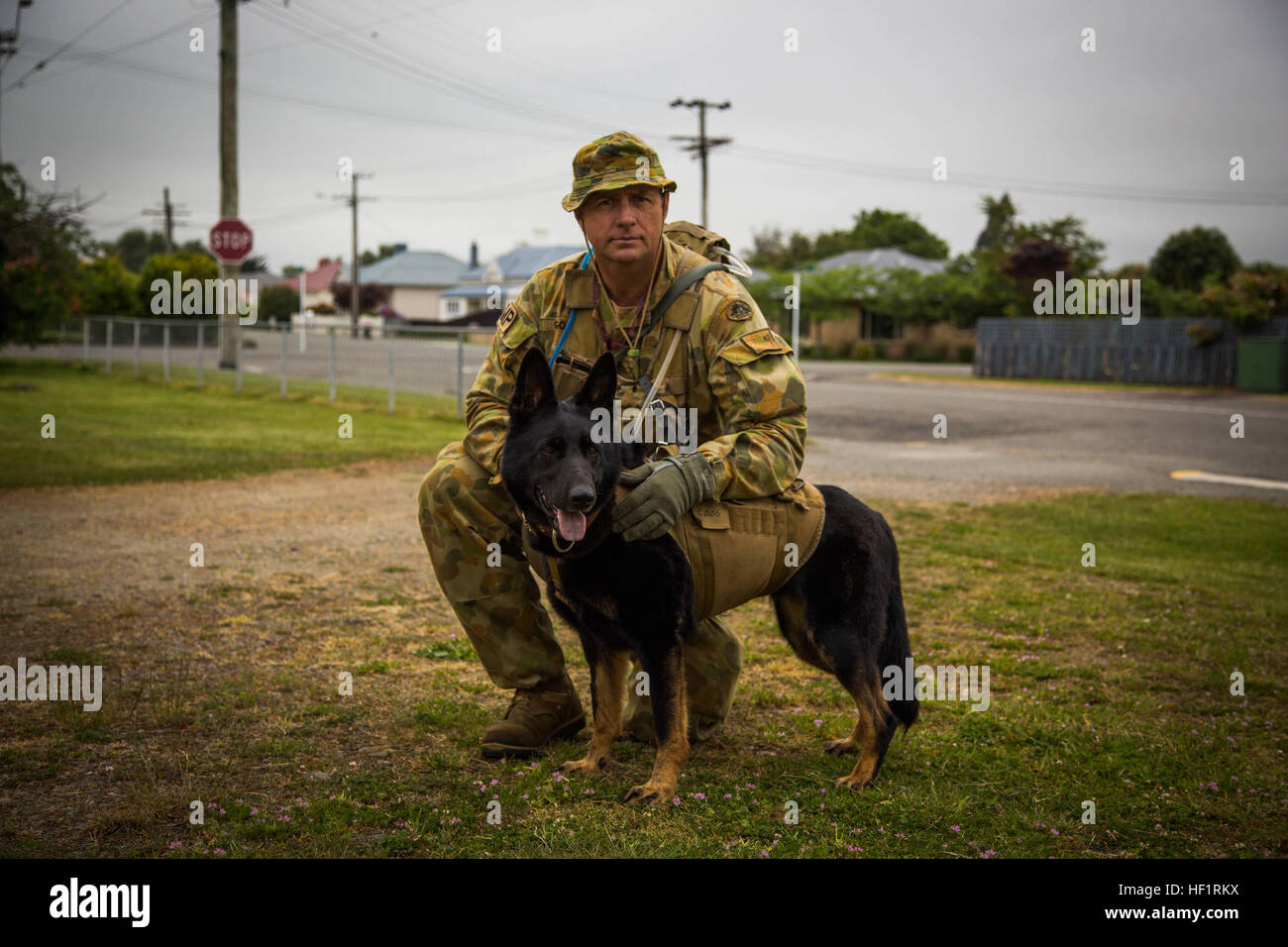 Australian Army Cpl. Steve Govett, a dog handler, and Akirra, a ...