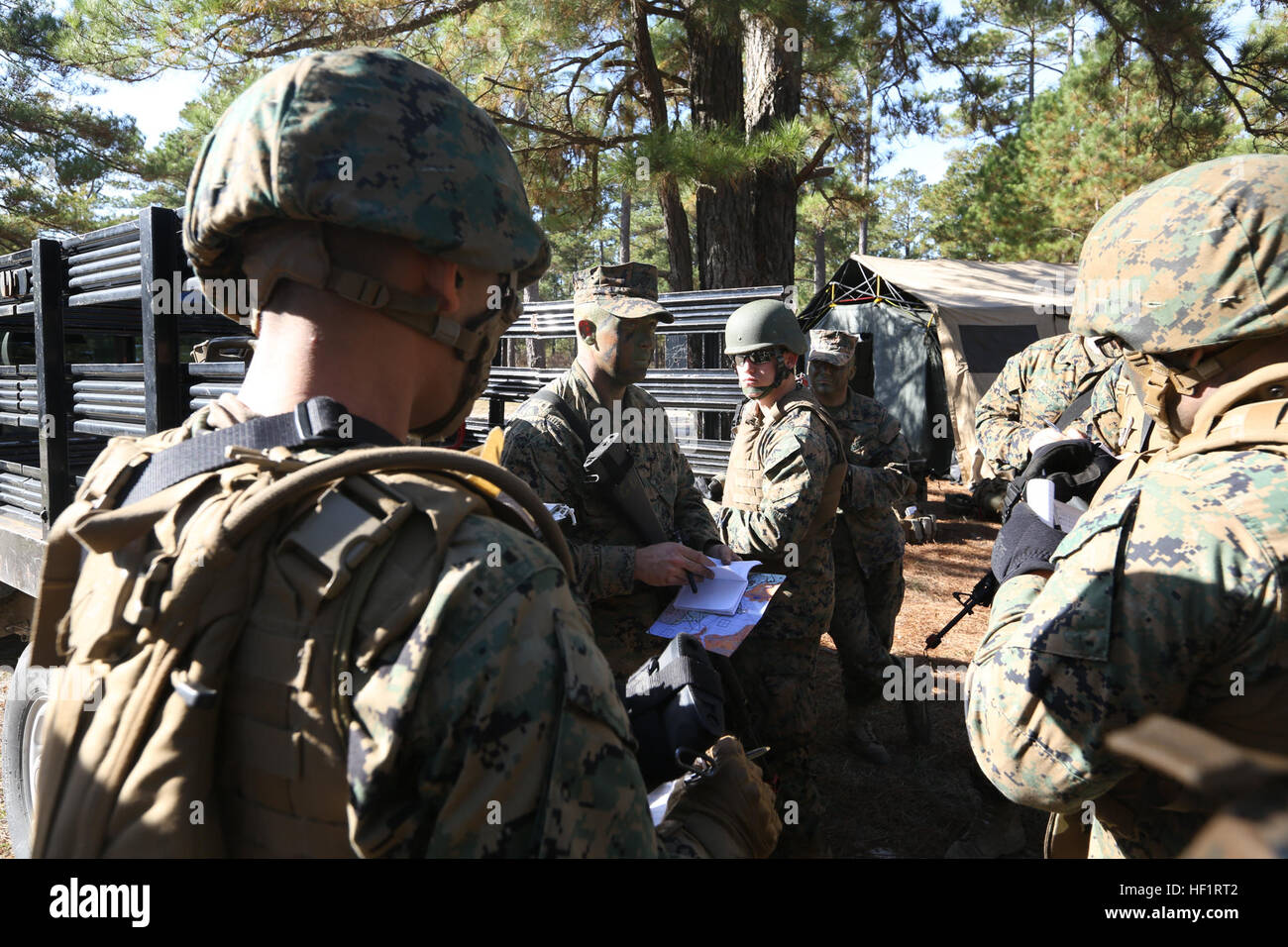 U.S. Marine Corps Cpl. Bryce Burton (center), current Operations Chief ...