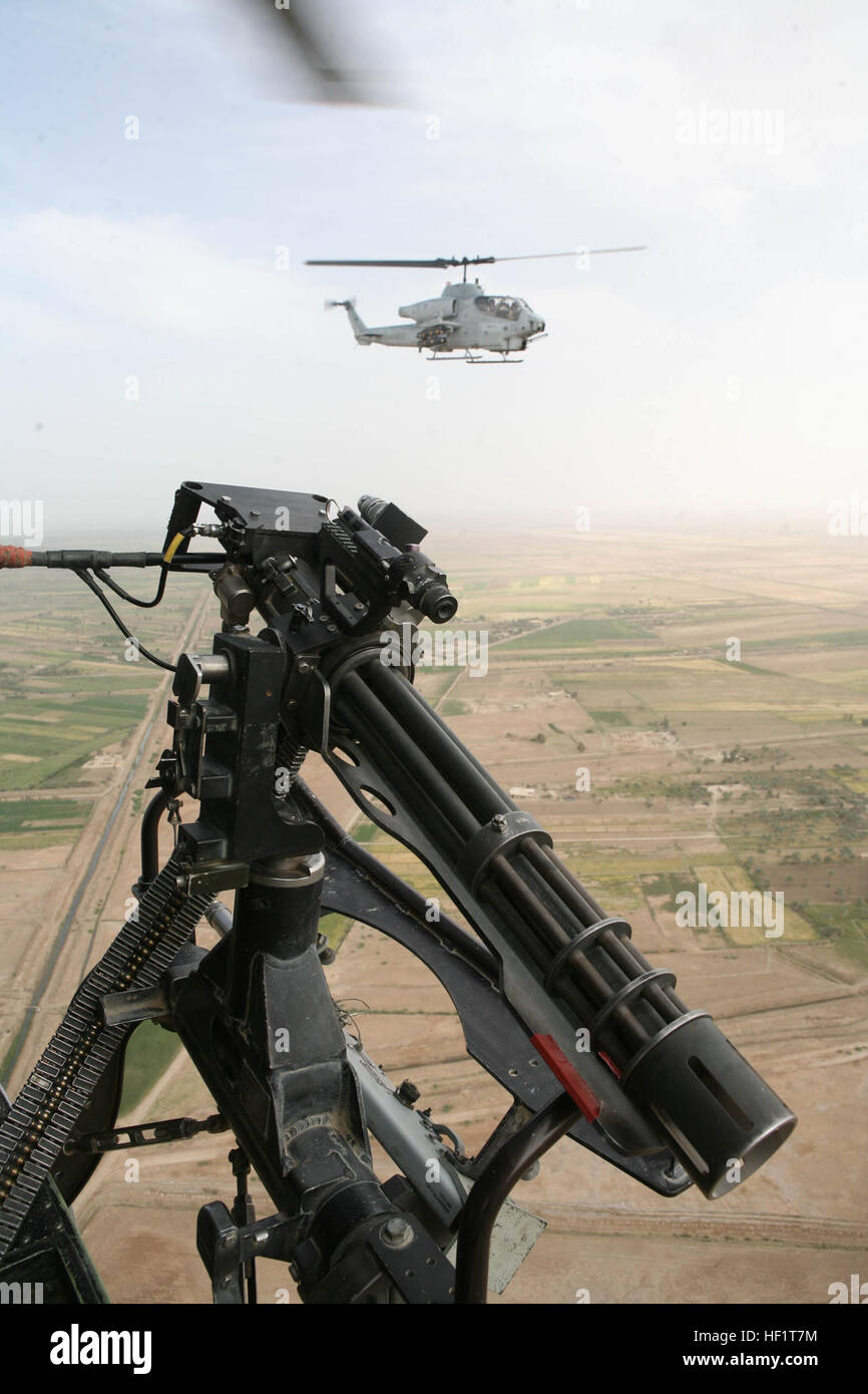 The twin engine UH-1N, otherwise known as the Huey, along side the AH ...