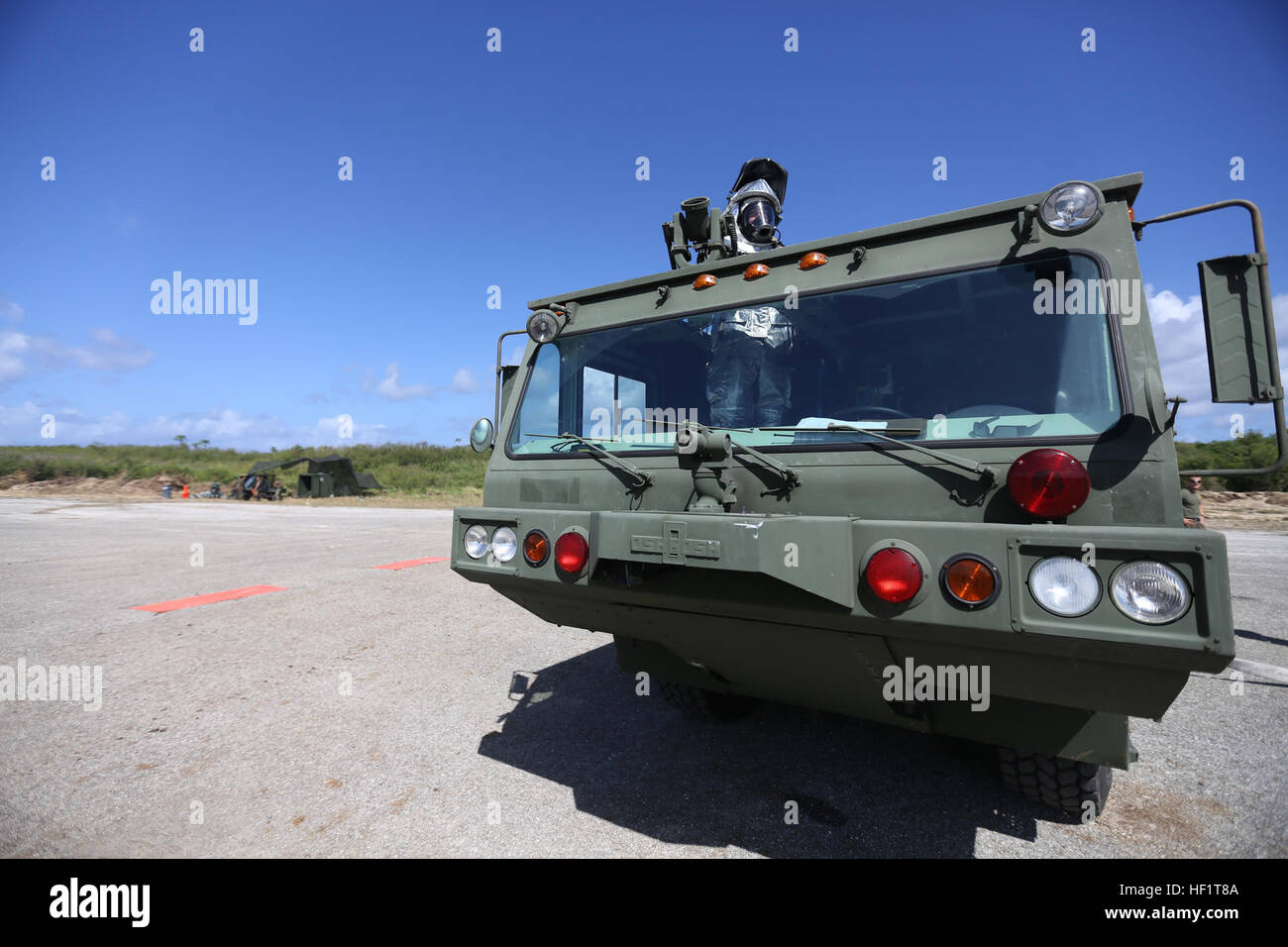 A U.S. Marine Corps turretman with Aircraft Rescue Fire Fighting ...