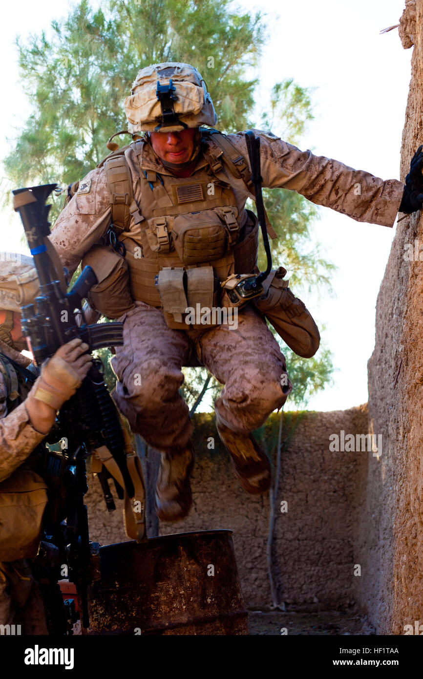 Marines from 1st Battalion, 9th Marines conduct a security sweep in a ...