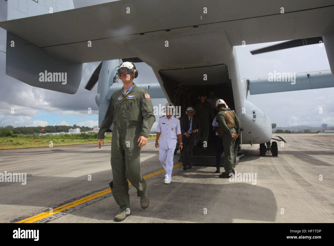 Guests disembarked from an MV-22B Osprey after a demonstration flight ...