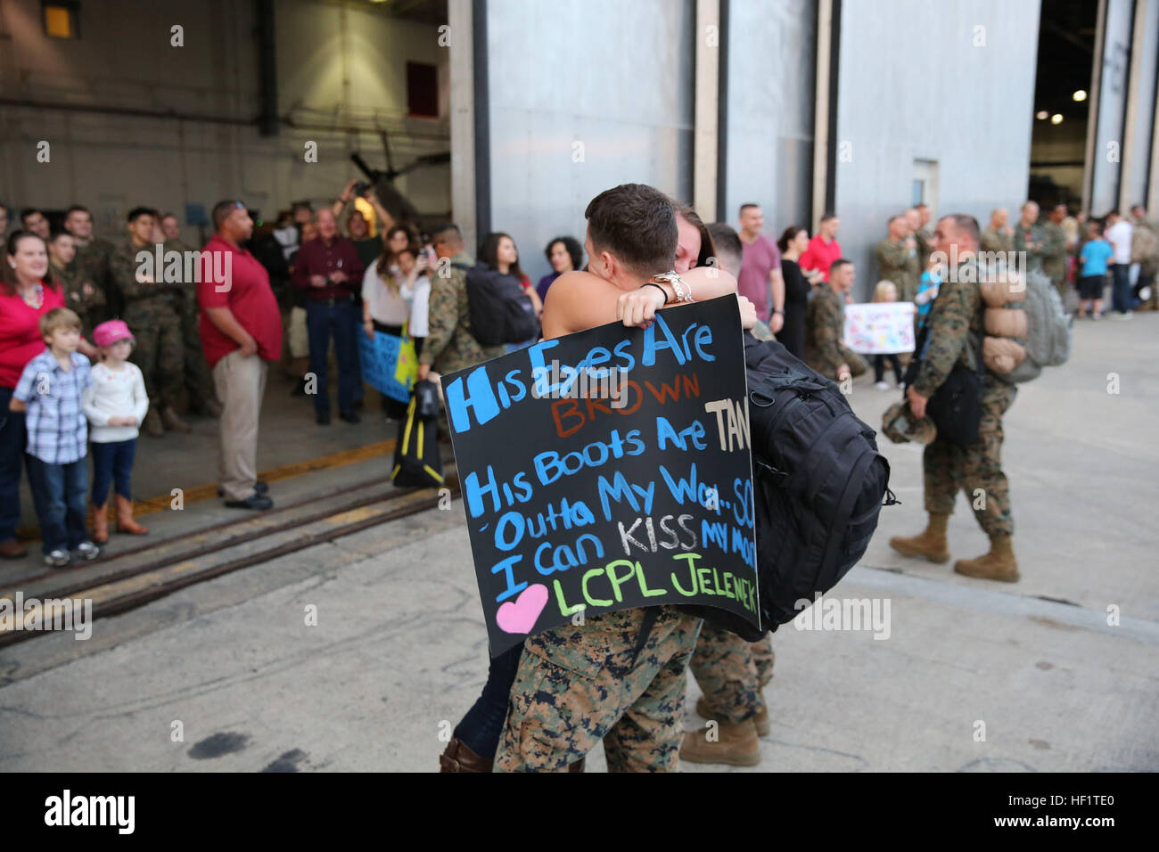 Marines with Marine Light Attack Helicopter Squadron (HMLA) 167 return ...