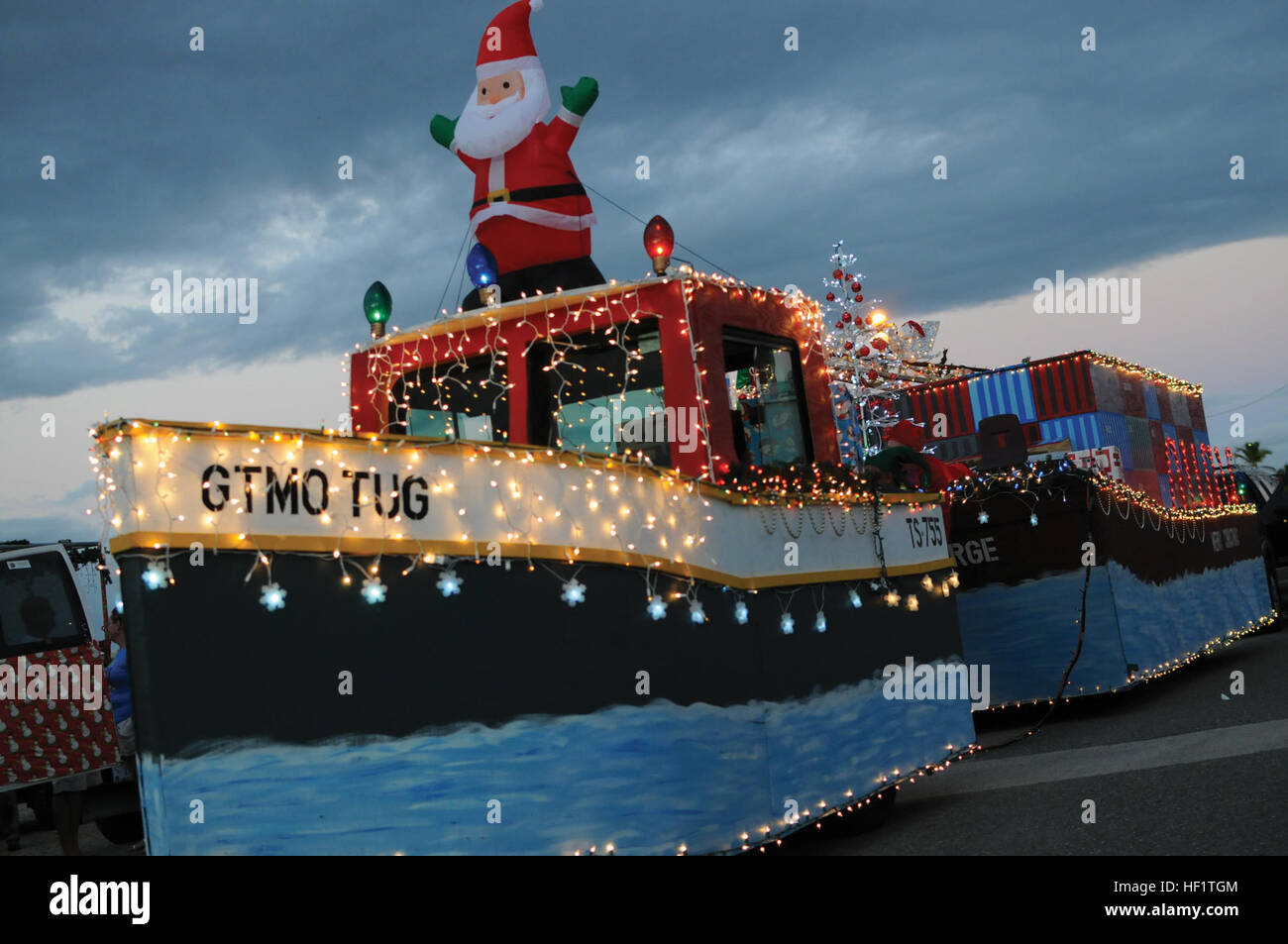 Two holiday floats - the GTMO Tug and Christmas Barge - built by ...