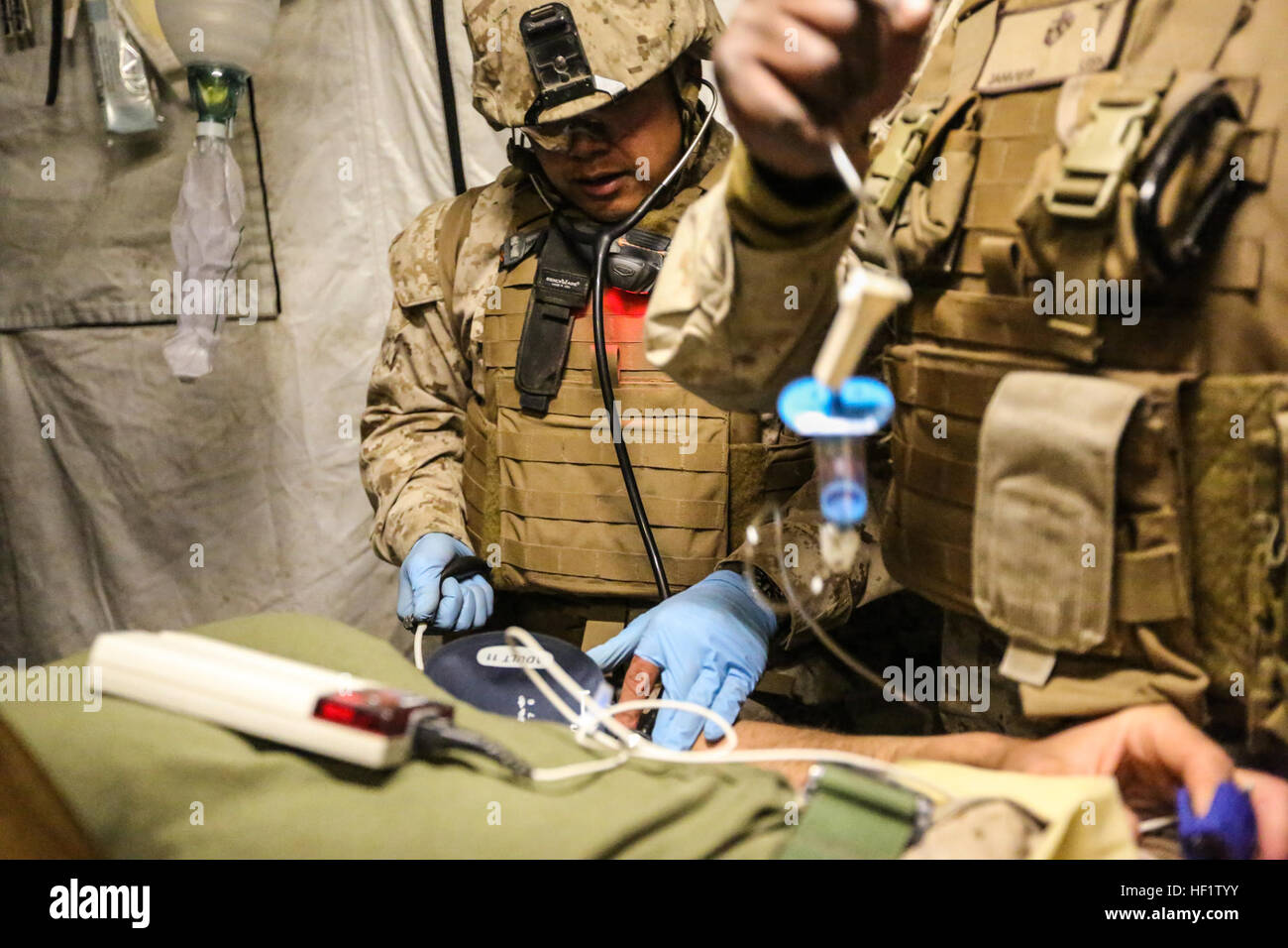 U.S. Navy Corpsman HM3 Thomas J. Camacho, with Headquarters Company ...