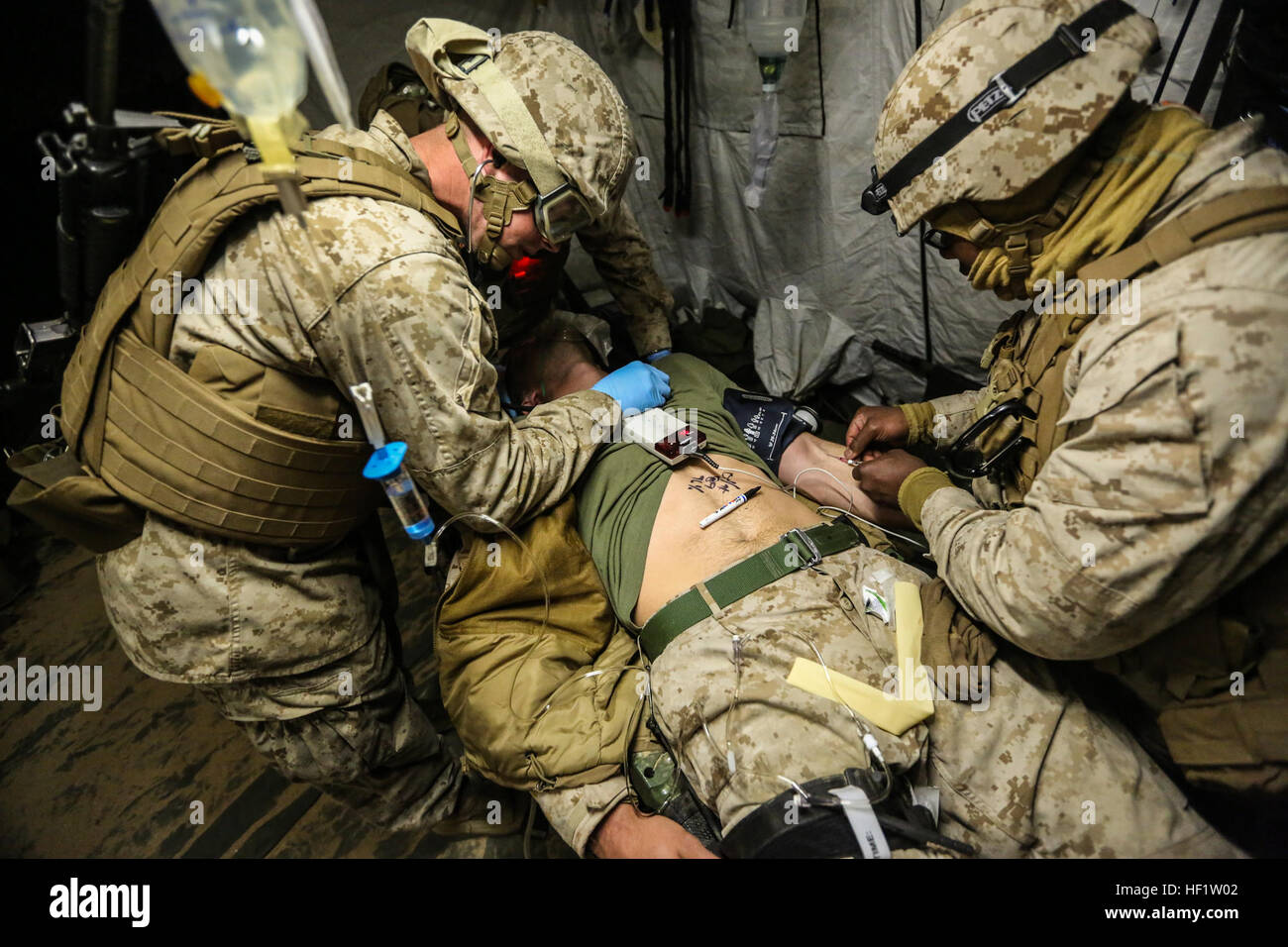 U.S. Navy Corpsmen, HM1 Michael K. Phillips (left) and HM3 Jean E ...
