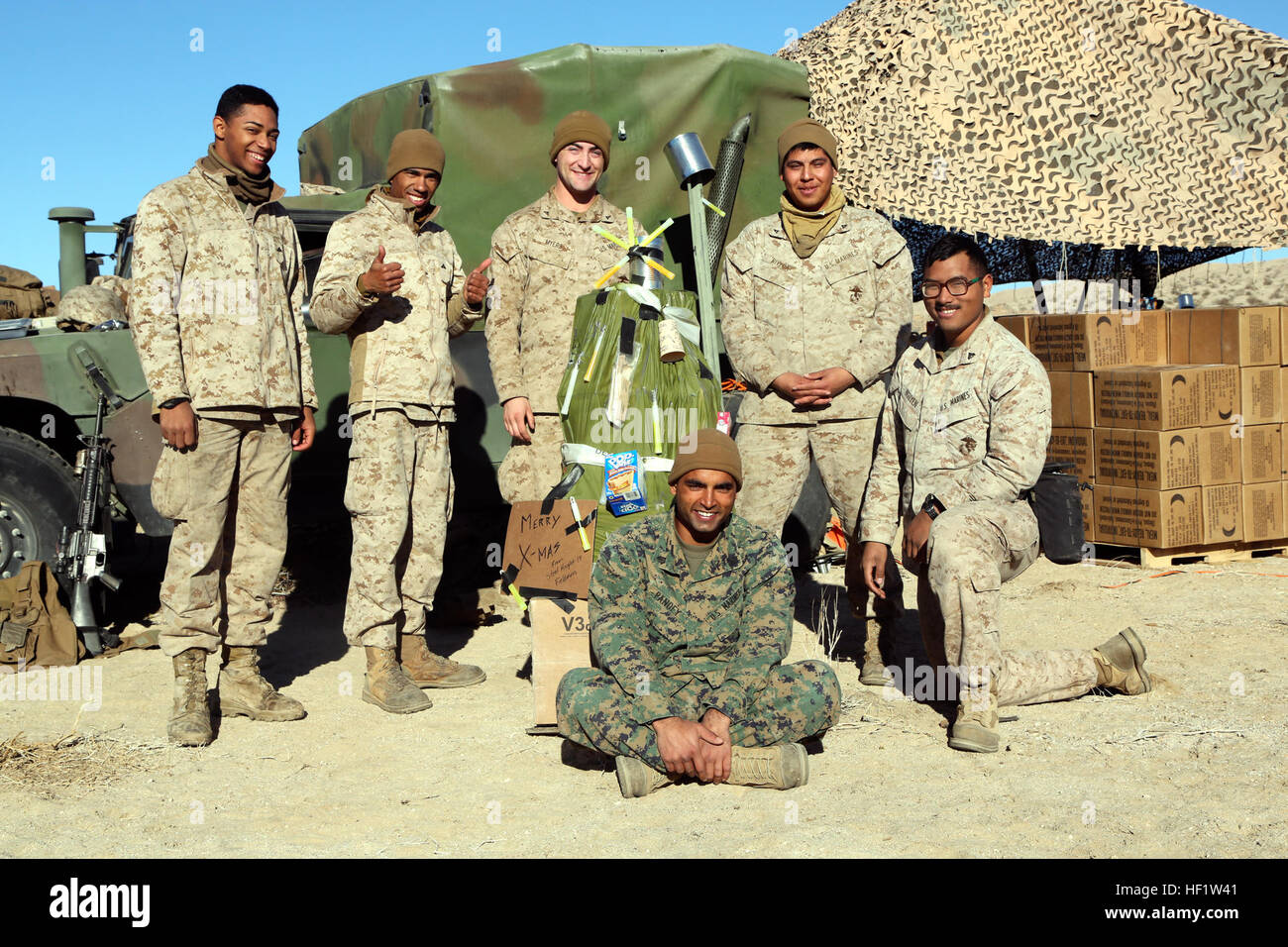 From left to right, U.S. Marine Corps Lance Corporal Shamikel Crawford ...