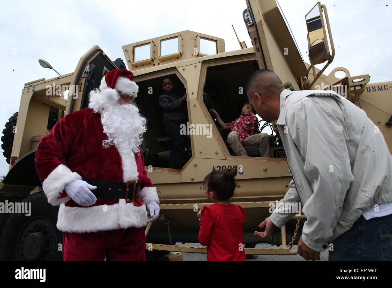 At Camp Foster Community Center, Santa Claus visits children on ...