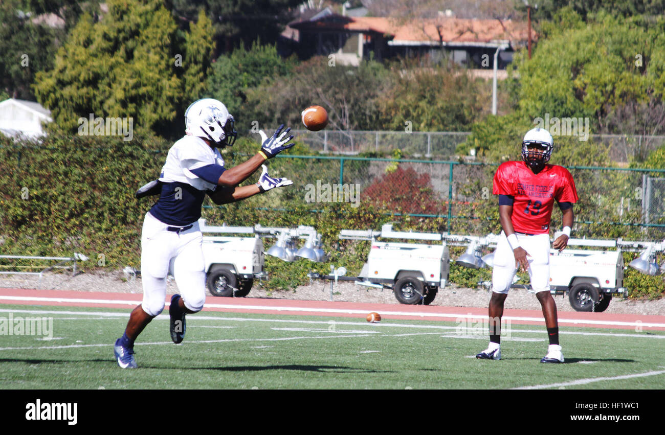 Quentin Gibson, quarterback from Marrero, L.A., rifles the football to ...