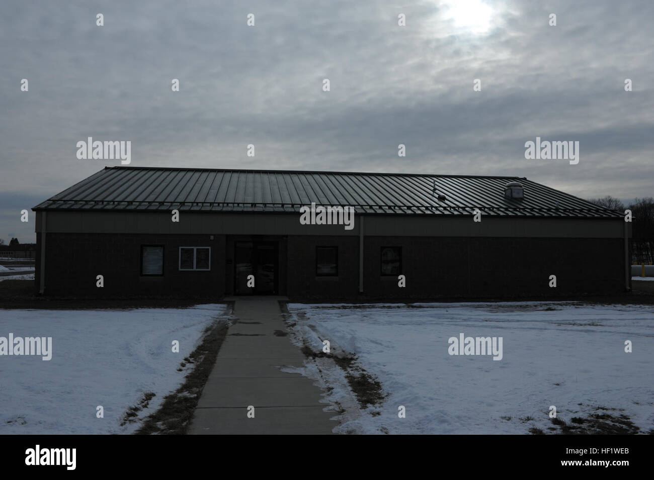 Shown, the chilly exterior of the EST building. Inside, service members ...