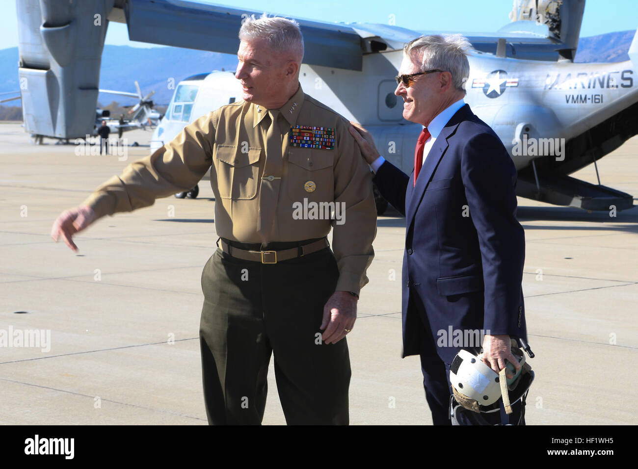 Secretary of the Navy Ray Mabus greets a U.S. Marine Corps Lieutenant ...