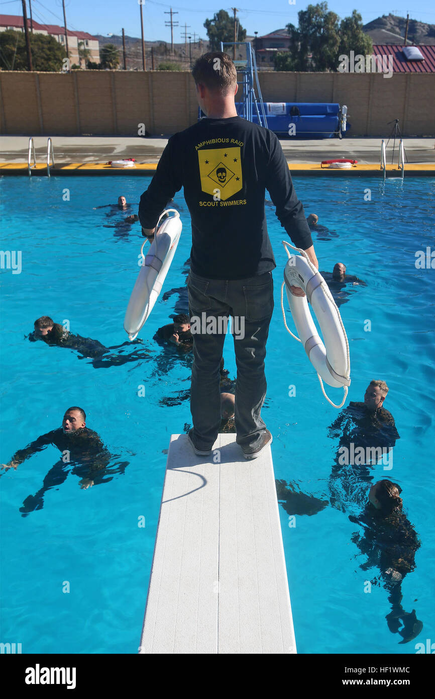A Marine Combat Instructor of Water Survival provides Marines guidance ...