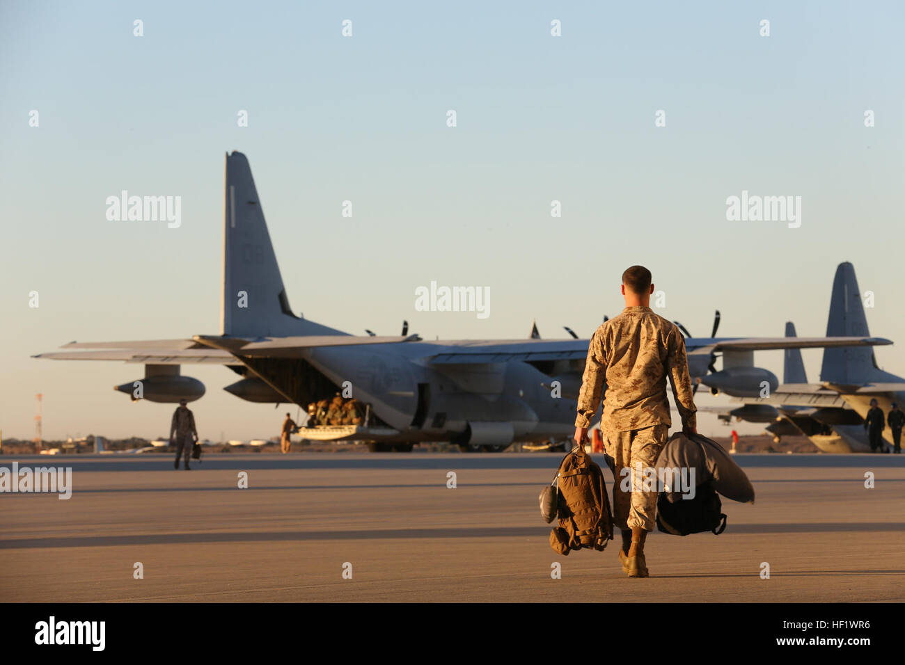 A U.S. Marine with Marine Aerial Refueler Transport Squadron (VMGR) 352 ...