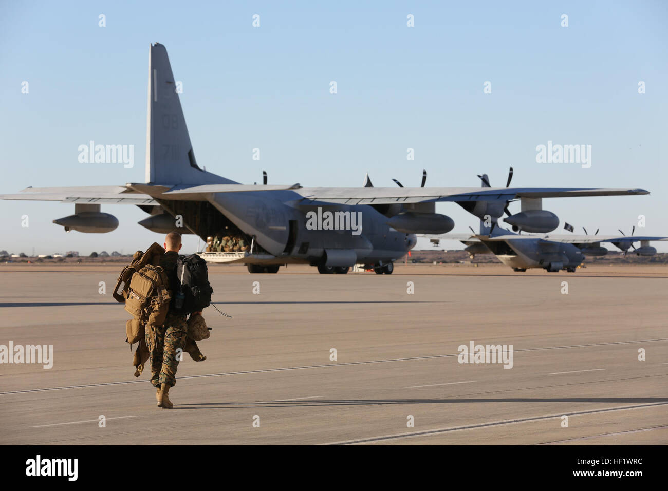 A U.S. Marine with Marine Aerial Refueler Transport Squadron (VMGR) 352 ...