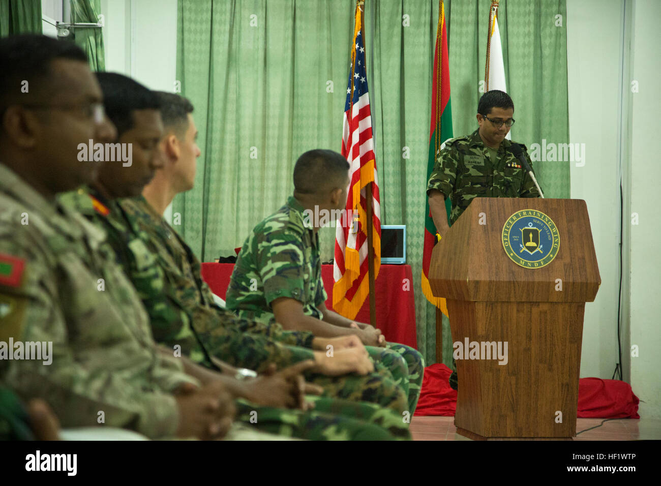 Maldives National Defense Force Capt. Ibrahim Ashraf, at lectern ...