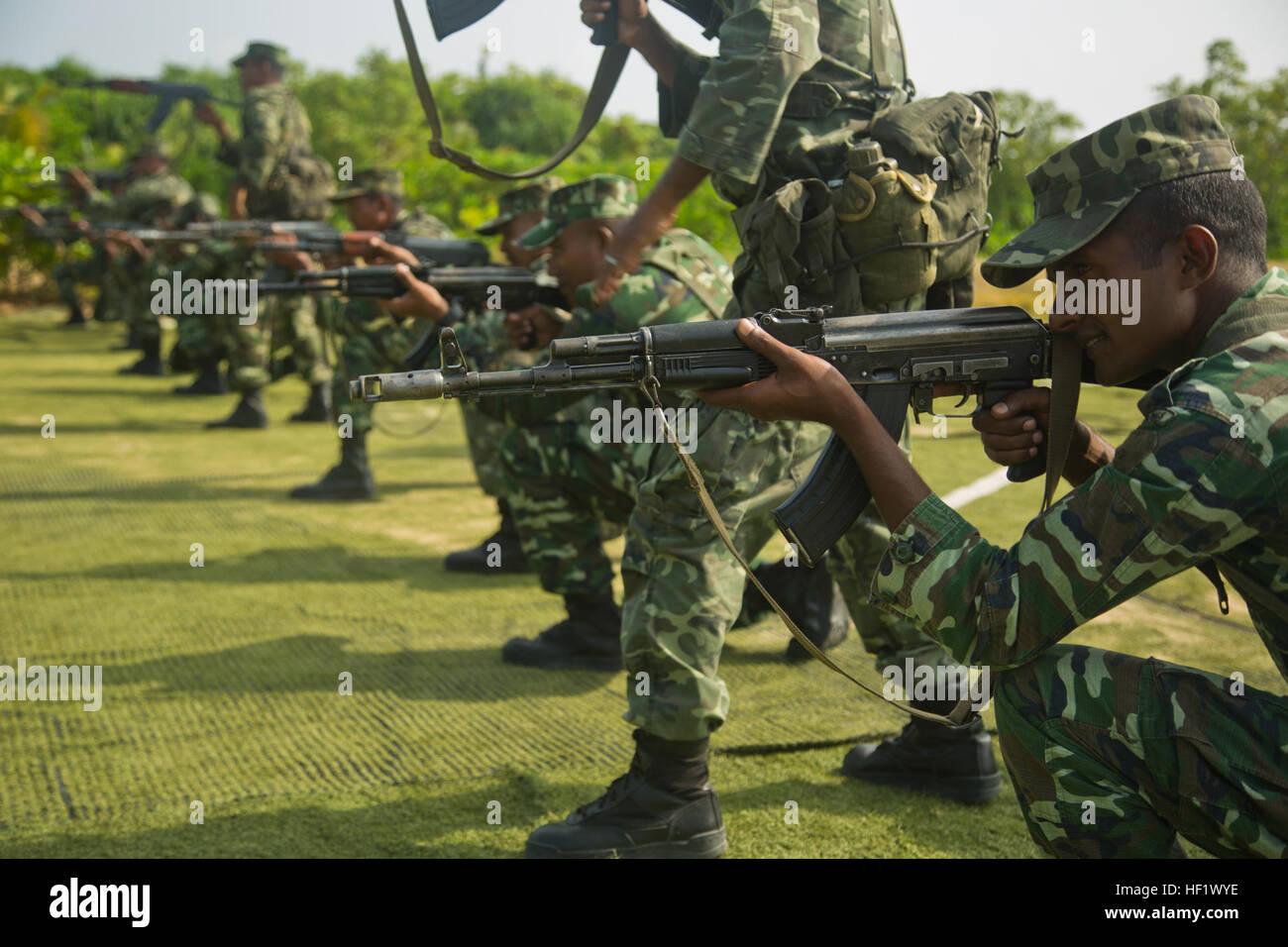 Maldivian marines practice shooting positions after a class given by U ...